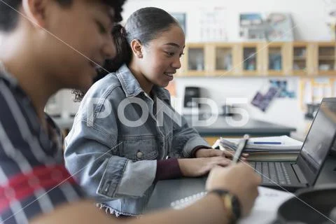 High school students studying at laptop in classroom ~ Premium Photo ...
