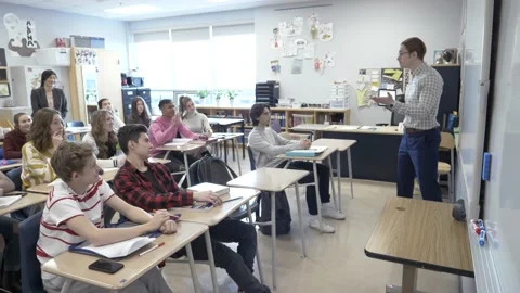 High school teacher leading lesson in cl... | Stock Video | Pond5