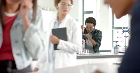 In high school, teenagers conducting sci... | Stock Video | Pond5