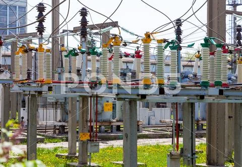 High voltage circuit breaker in a power substation in sunny day Stock ...