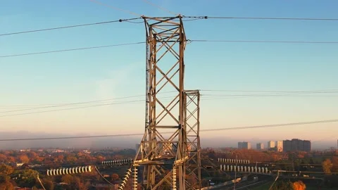 High voltage electric towers at golden h... | Stock Video | Pond5
