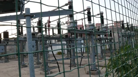 High voltage power station, seen trough ... | Stock Video | Pond5