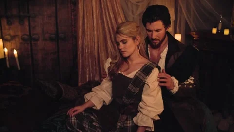 Highlander Man Undressing a Lady | Stock Video | Pond5