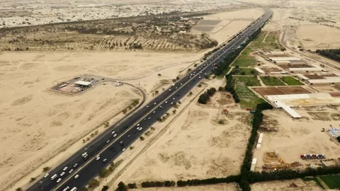 Highway in Kuwait desert landscape, cars... | Stock Video | Pond5