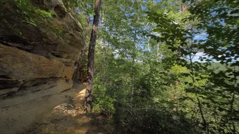 Hiking a High Ledge Trail over Red River... | Stock Video | Pond5