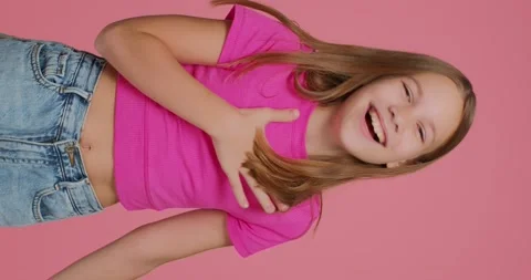 Hilarious elementary child girl hooligan... | Stock Video | Pond5