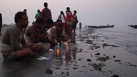 Hindu devotees praying before their holy... | Stock Video | Pond5