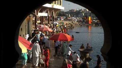 Hindu devotees taking religious bathing ... | Stock Video | Pond5