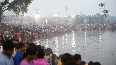 Hindu devotees worship on Chat Puja Indi... | Stock Video | Pond5