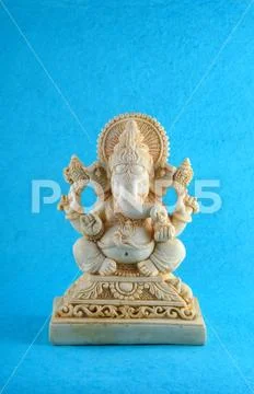 Hindu God Ganesha. Ganesha Idol on blue background Stock Image #77009921
