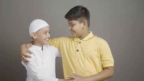 hindu muslim kids both showing unity | Stock Video | Pond5