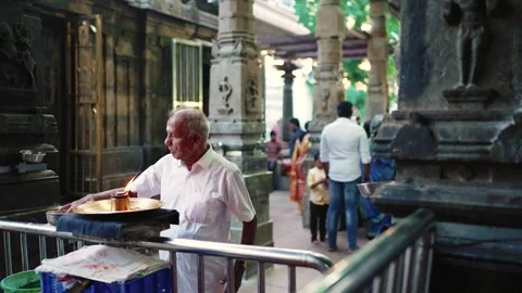 Hindu old man praying in a temple. | Stock Video | Pond5