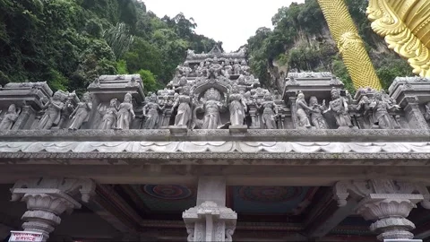Hindu statues on entrance gate arch at s... | Stock Video | Pond5