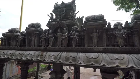 Hindu statues on entrance gate arch at s... | Stock Video | Pond5