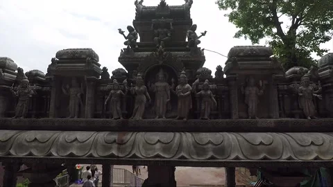 Hindu statues on entrance gate arch at s... | Stock Video | Pond5
