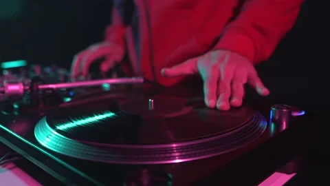 Hip hop deejay scratching records on tur... | Stock Video | Pond5