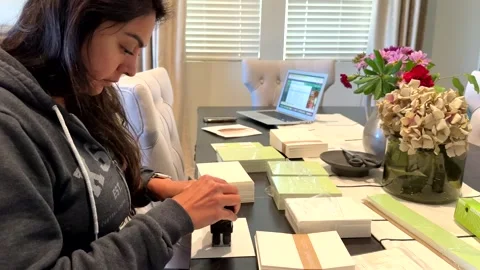 Hispanic bride working on wedding invita... | Stock Video | Pond5