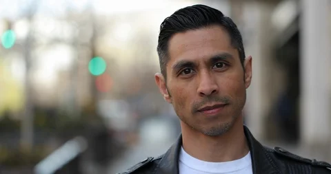 Hispanic Latino man in city face portrai... | Stock Video | Pond5