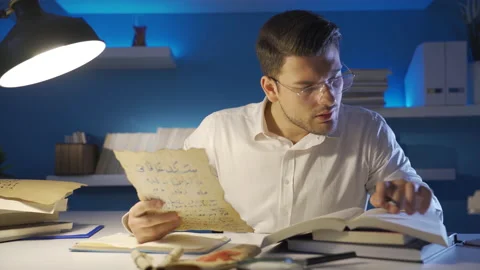 Historian who studies and studies a medi... | Stock Video | Pond5