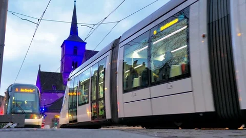 Historic city trams at night and church ... | Stock Video | Pond5