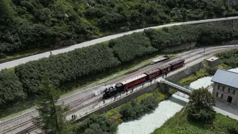 A historic steam train runs over a mount... | Stock Video | Pond5