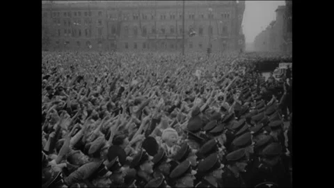 Hitler walks past and salutes cheering c... | Stock Video | Pond5