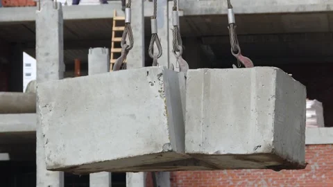 hoisting a concrete slab with crane usin... | Stock Video | Pond5