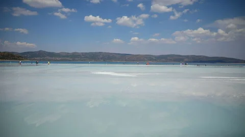 Holidaymakers sunbathing at beach on Sal... | Stock Video | Pond5