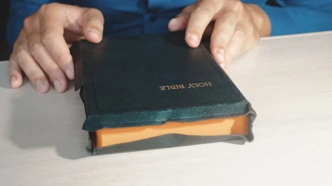 Holy Bible. Man preacher praying to God ... | Stock Video | Pond5