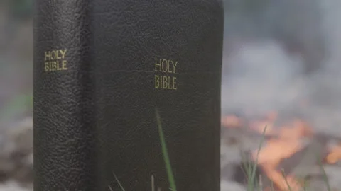 Holy Bible Standing on the Ground in Fro... | Stock Video | Pond5