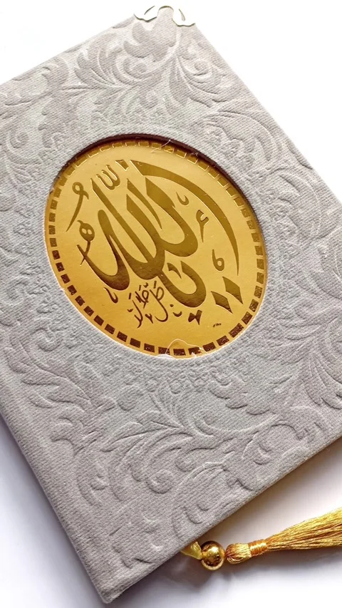 Holy Quran book with yellow gold Allah W... | Stock Video | Pond5
