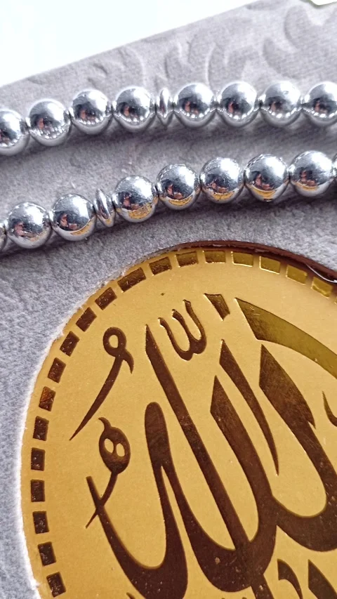 Holy Quran book with yellow gold Allah W... | Stock Video | Pond5