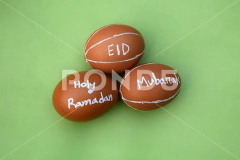 Photograph: Holy Ramadan and Eid Mubarak hand typography on the egg ...