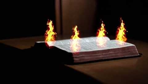 Holy Spirit of fire on Holy Bible pages | Stock Video | Pond5