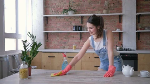 home routines, smiling housewife girl in... | Stock Video | Pond5