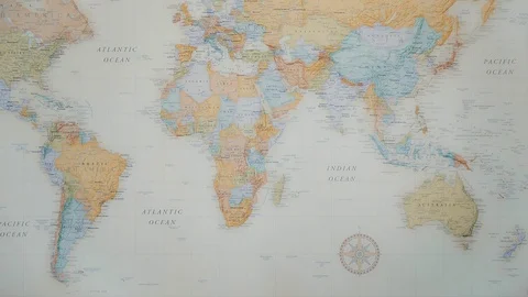 Home travel planning on world map | Stock Video | Pond5