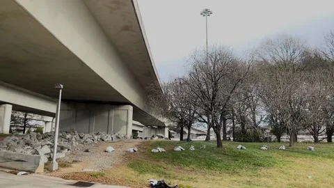 Homeless camp and people under bridges d... | Stock Video | Pond5