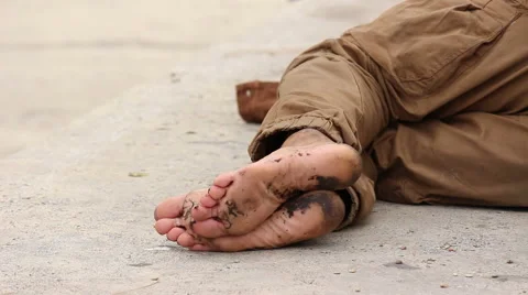 Homeless dirty feet with flies | Stock Video | Pond5