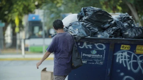 Man Dumpster Stock Video Footage | Royalty Free Man Dumpster Videos | Pond5