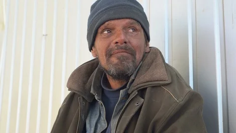 Homeless man living on the street crying... | Stock Video | Pond5