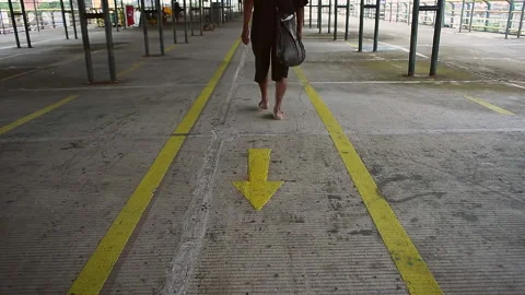 Homeless man walk away in empty parking ... | Stock Video | Pond5