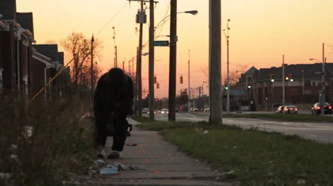 homeless man walking on Detroit street (... | Stock Video | Pond5