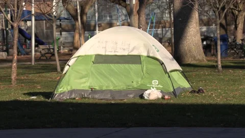 Homeless people sleep in tents during CO... | Stock Video | Pond5