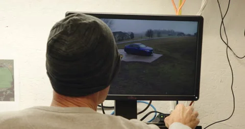 Homeowner reviewing security camera foot... | Stock Video | Pond5