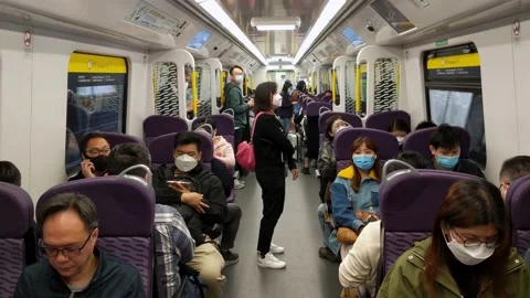 Hong Kong MTR passengers sitting in firs... | Stock Video | Pond5