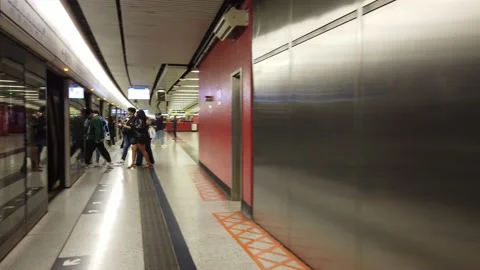 Hong Kong MTR Train Door Open and Walk O... | Stock Video | Pond5
