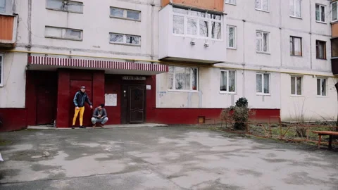 Hooligans at entrance door of high-rise ... | Stock Video | Pond5