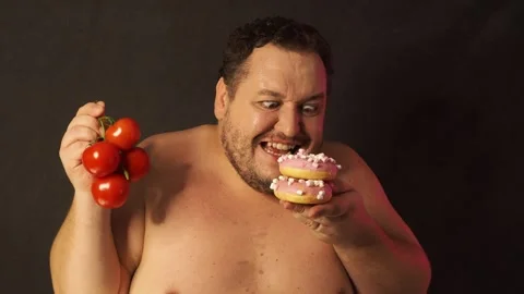 Hope for a miracle. Funny fat man and di... | Stock Video | Pond5