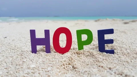 Hope on White Sand Beach Background with... | Stock Video | Pond5