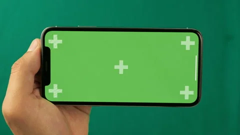 Horizontal smartphone in the hand closeu... | Stock Video | Pond5